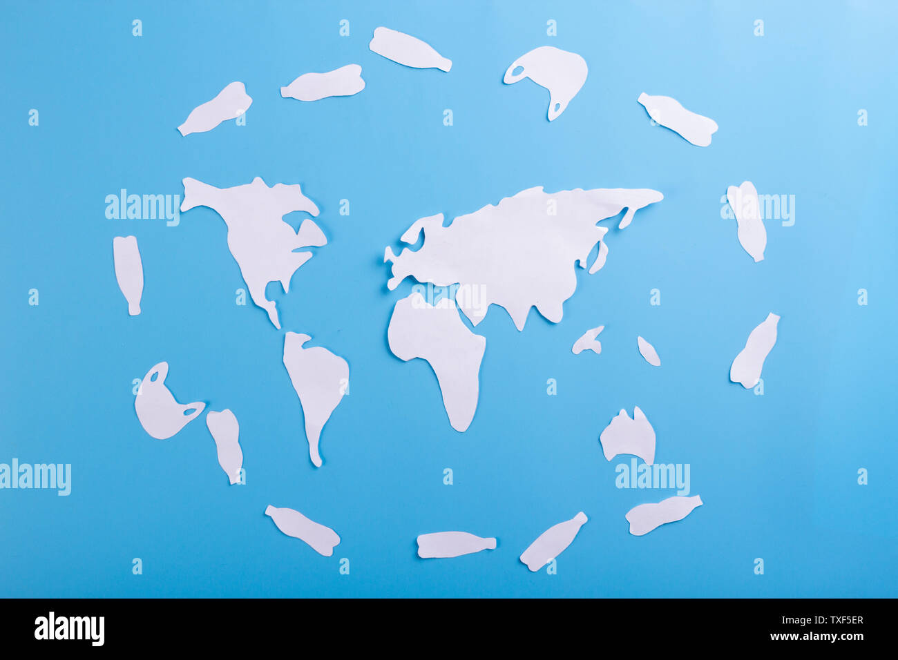 The concept of World Environment Day. world map with plastic bottles ...