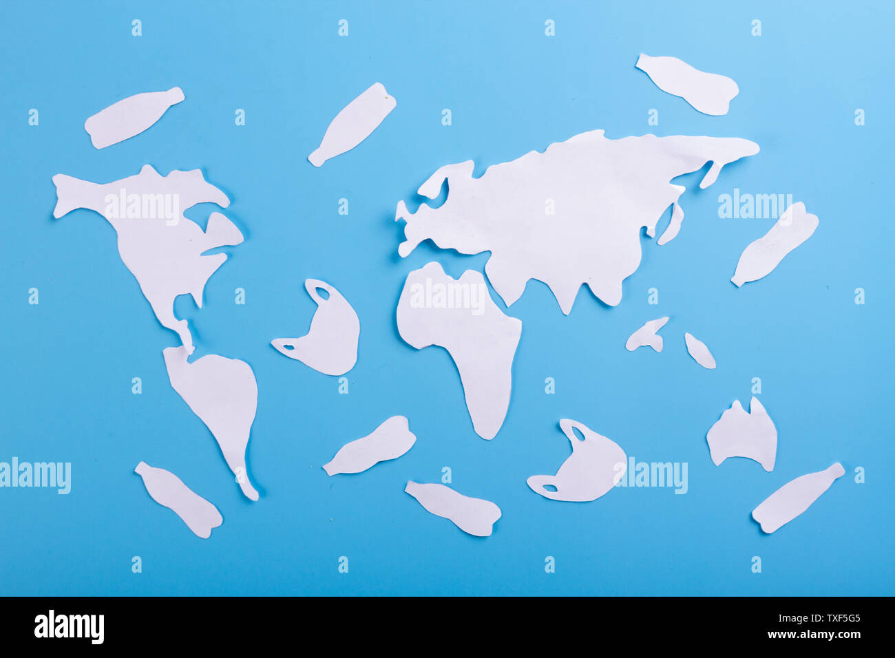 The concept of World Environment Day. world map with plastic bottles ...