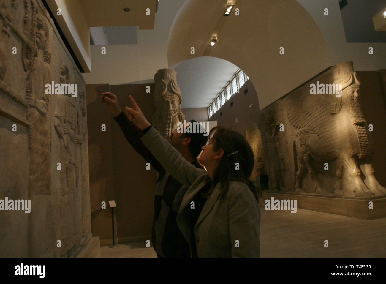 People visit the Iraqi National Museum after its reopening in Baghdad ...
