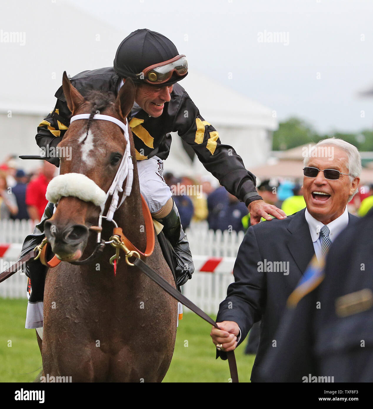 Trainer D. Wayne Lukas leads Oxbow and Jockey Gary Stevens to the ...
