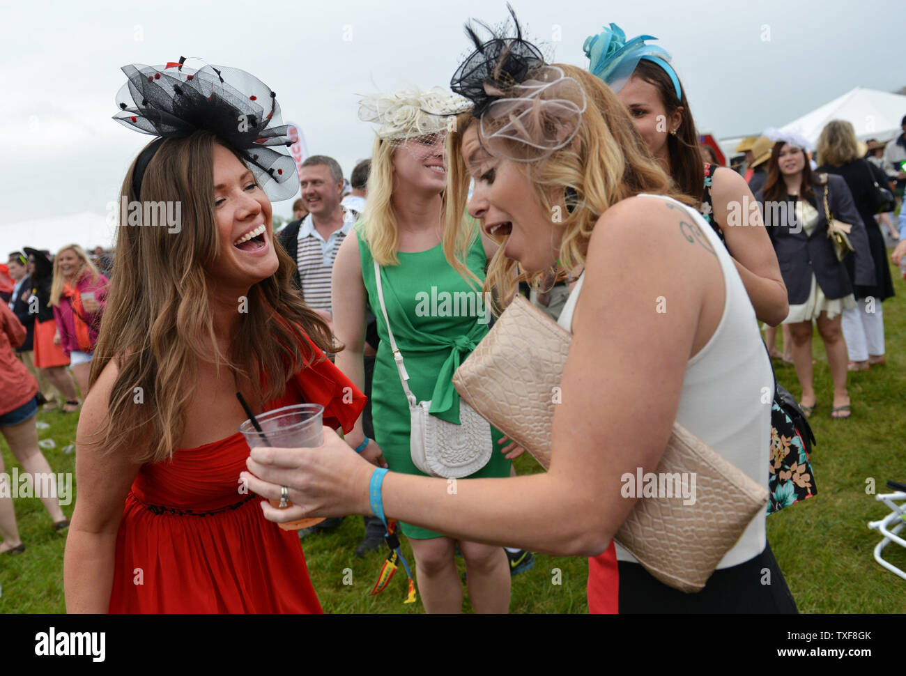 Race fans enjoy the infield at the Preakness Stakes at Pimlico Race ...
