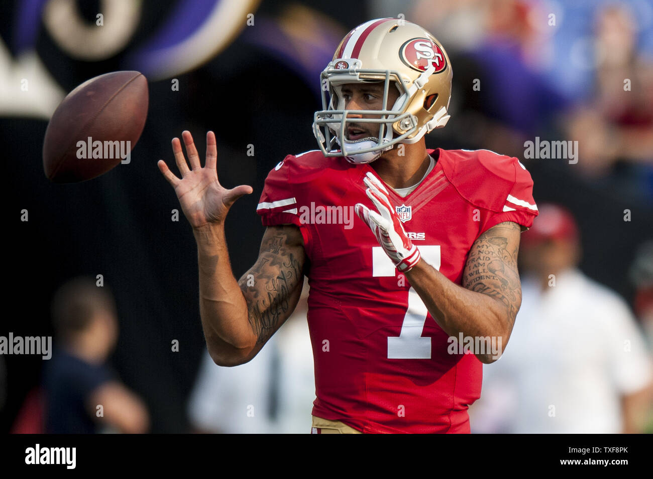 San Francisco 49ers quarterback Colin Kaepernick warms up before their ...