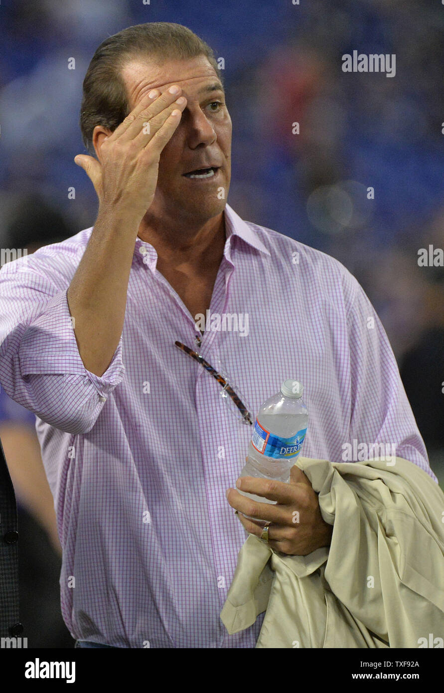 Baltimore Ravens owner Steve Bisciotti is seen on the field prior to ...