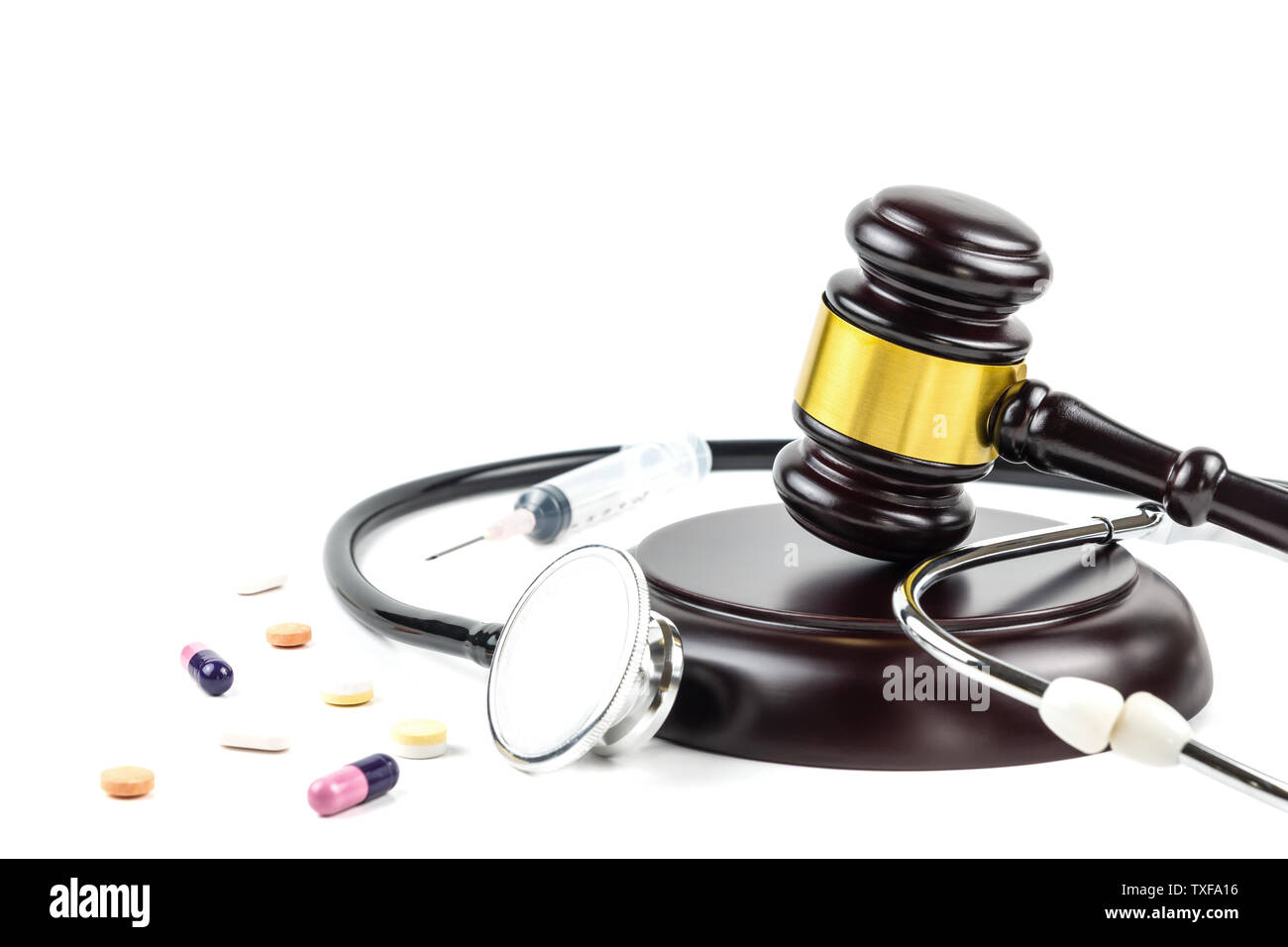 A photo of gavel and stethoscope on white background Stock Photo - Alamy