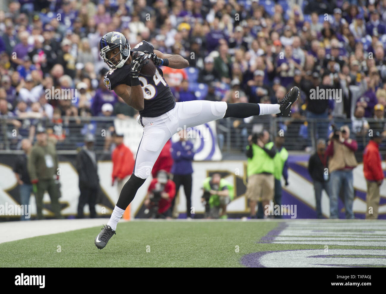 Baltimore Ravens wide receiver Chris Matthews (84) brings in an 8 yard ...