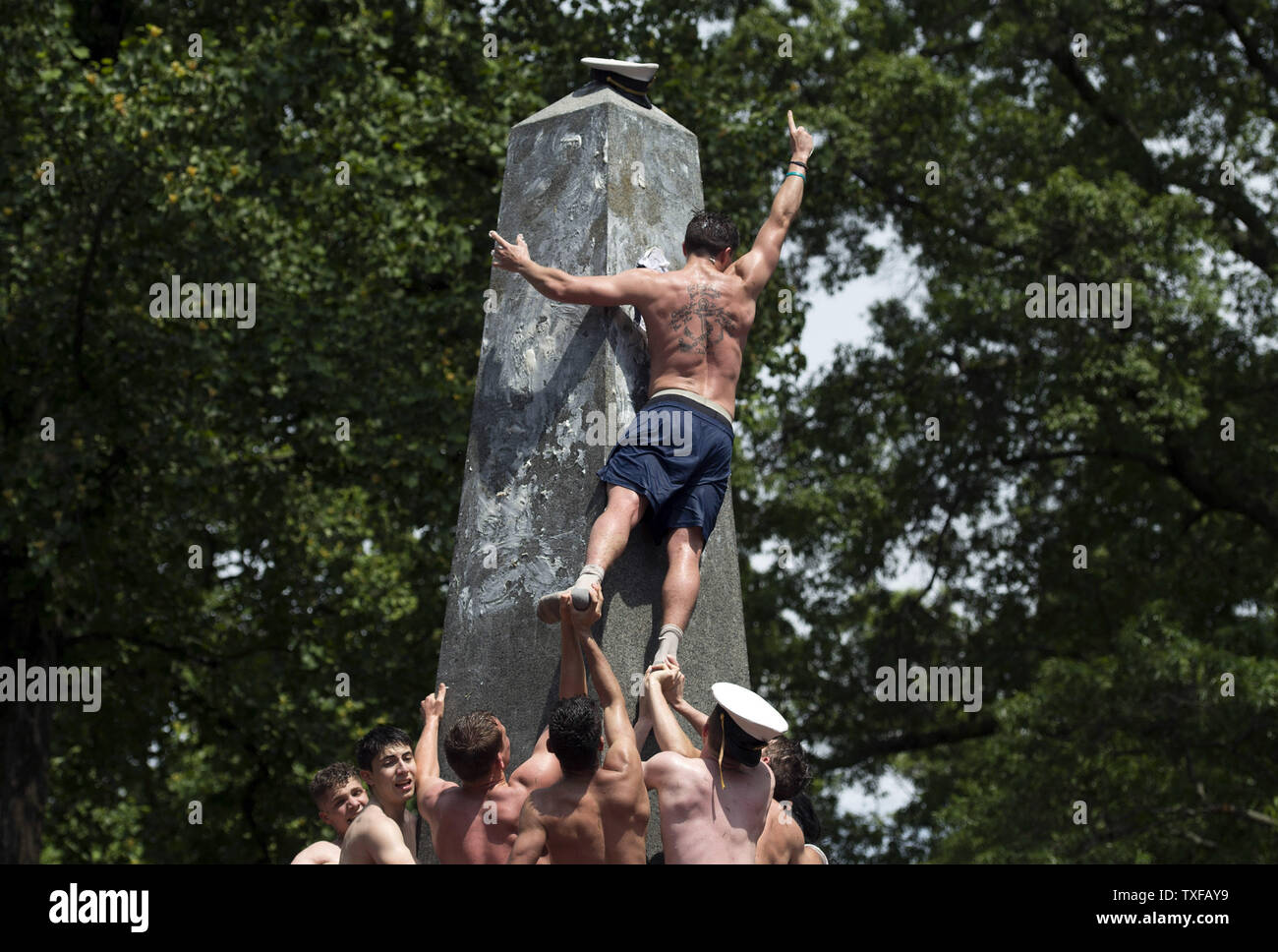 U.S. Naval Academy Midshipman 4th Class Chris Bianchi celebrates after ...