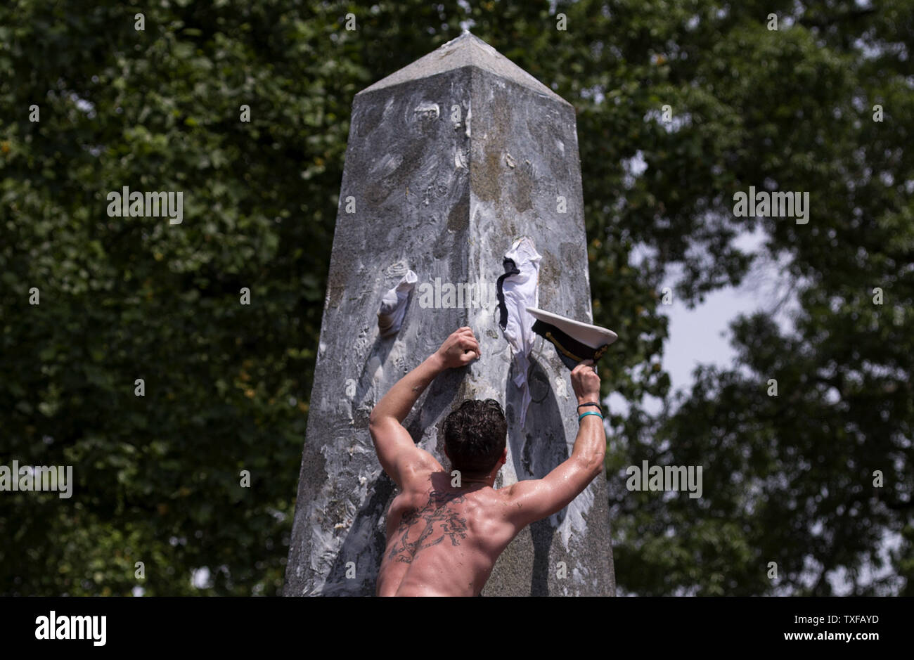 U.S. Naval Academy Midshipman 4th Class Chris Bianchi celebrates after ...