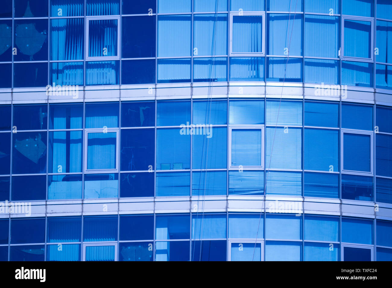 new skyscraper windows close up. blue color Stock Photo - Alamy