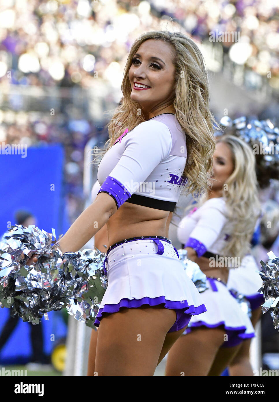A Baltimore Ravens cheerleader performs against the New Orleans Saints ...