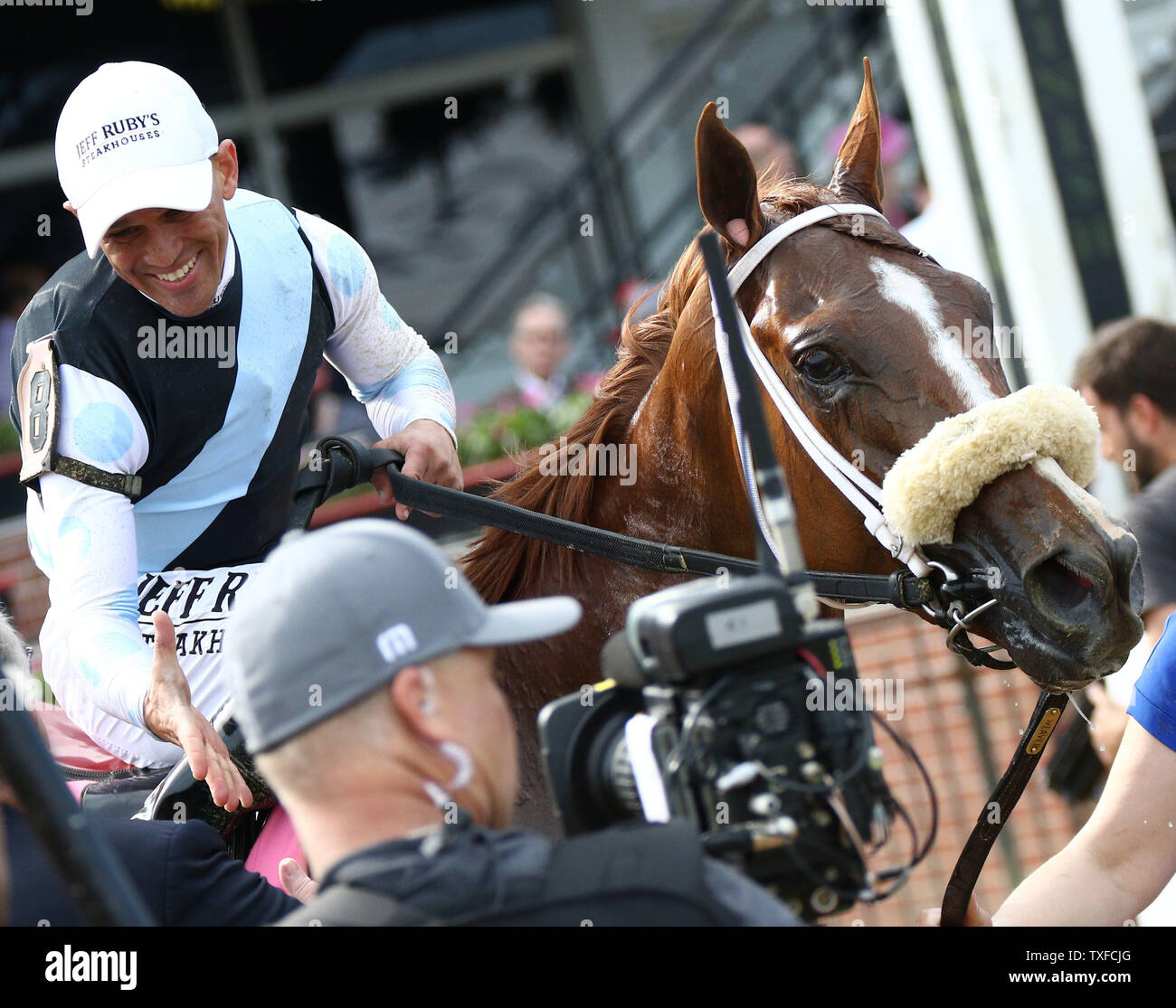 Javier Castellano gets congratulated after winning the Black Eyed Susan ...