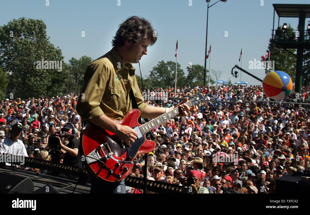 Bandleader Jim Cuddy of Blue Rodeo performs before an audience of ...