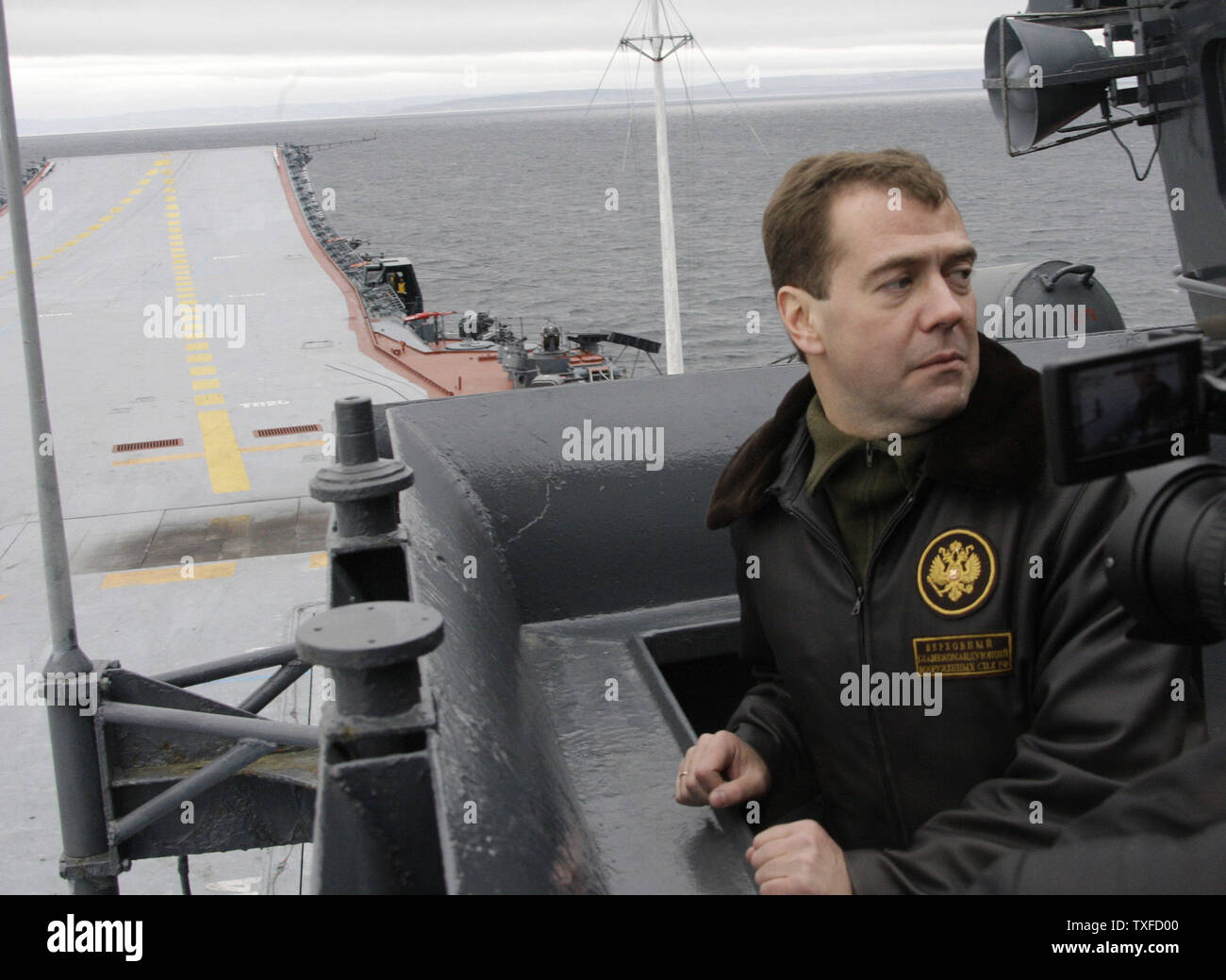 Russian President Dmitry Medvedev inspects the cruiser Admiral ...