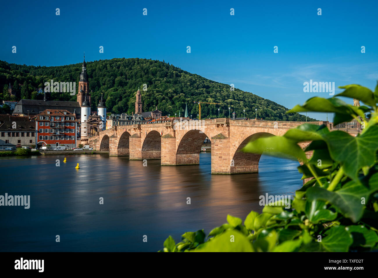 view on karl theodor (old) bridge crossing the neckar river, germany ...