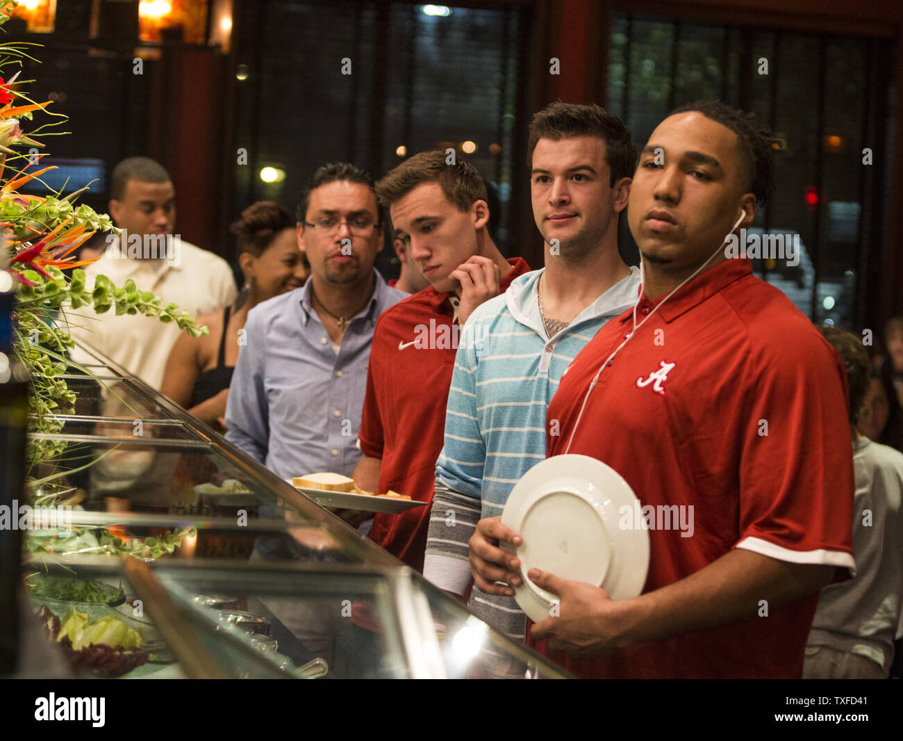University of Alabama football players Brandon Ivory (right) and ...