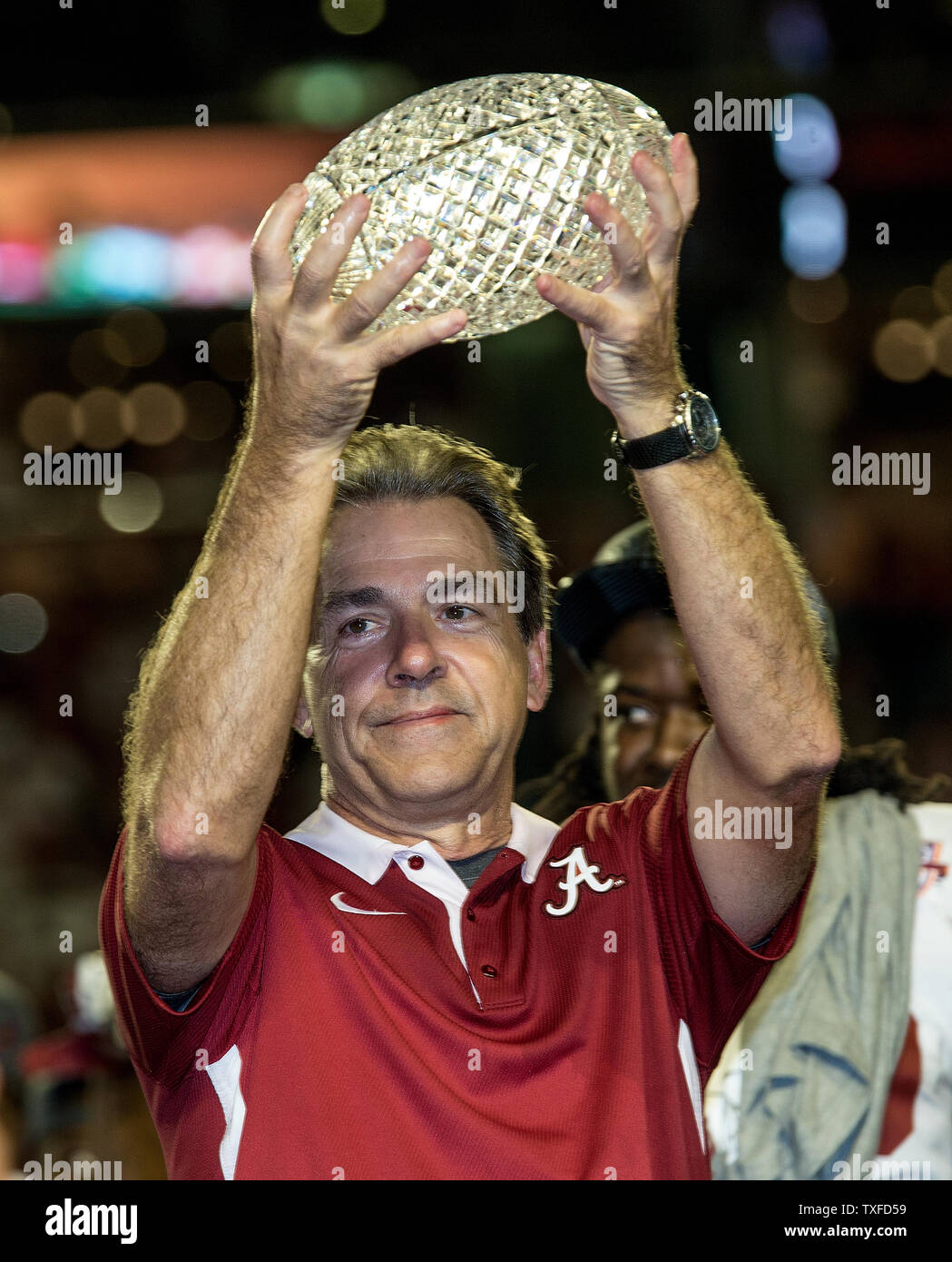 Nick saban with trophy in 2013 hi-res stock photography and images - Alamy