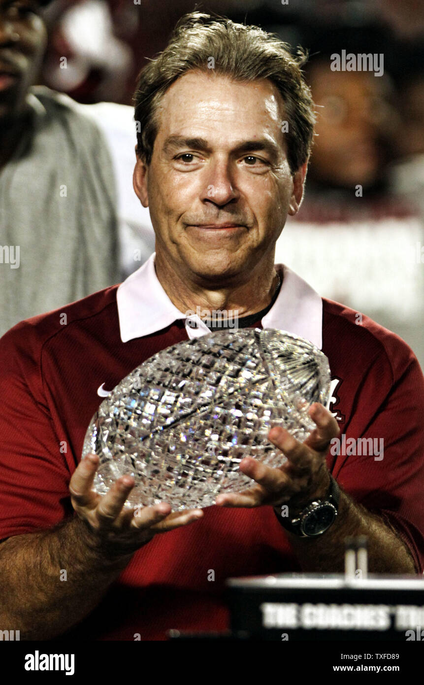 Nick saban with trophy in 2013 hi-res stock photography and images - Alamy