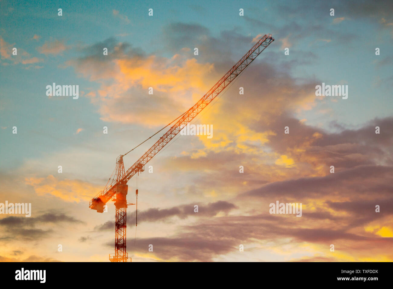 construction site over sunset sky background Stock Photo - Alamy