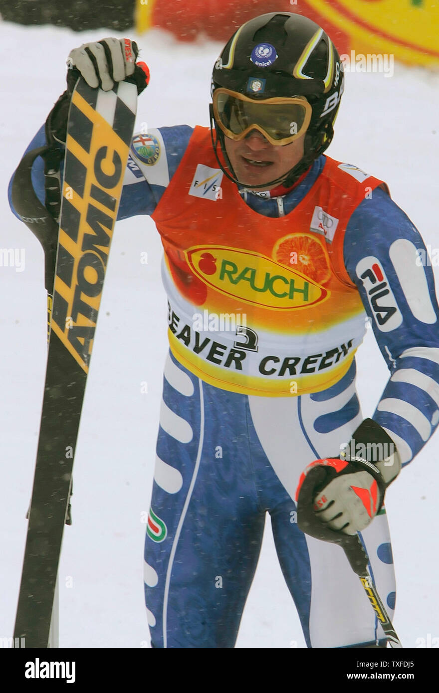 Italy's Giorgio Rocca celebrates his victory in the men's World Cup ...