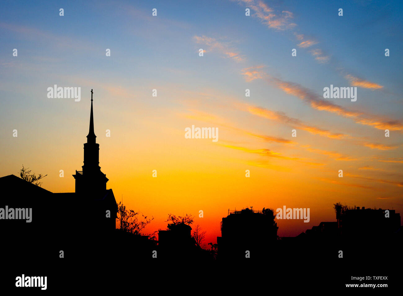 Church in the sunset Stock Photo - Alamy