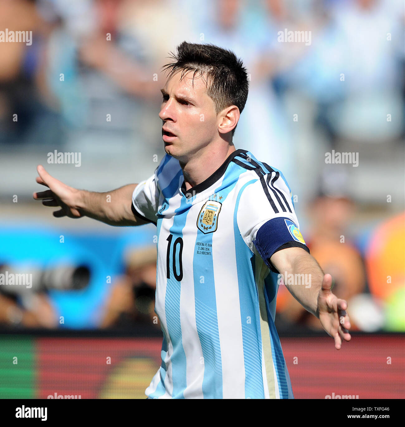 Lionel Messi of Argentina celebrates scoring the opening goal during ...