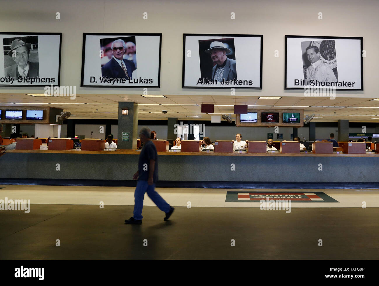 The betting windows are relatively empty prior to the first race on ...