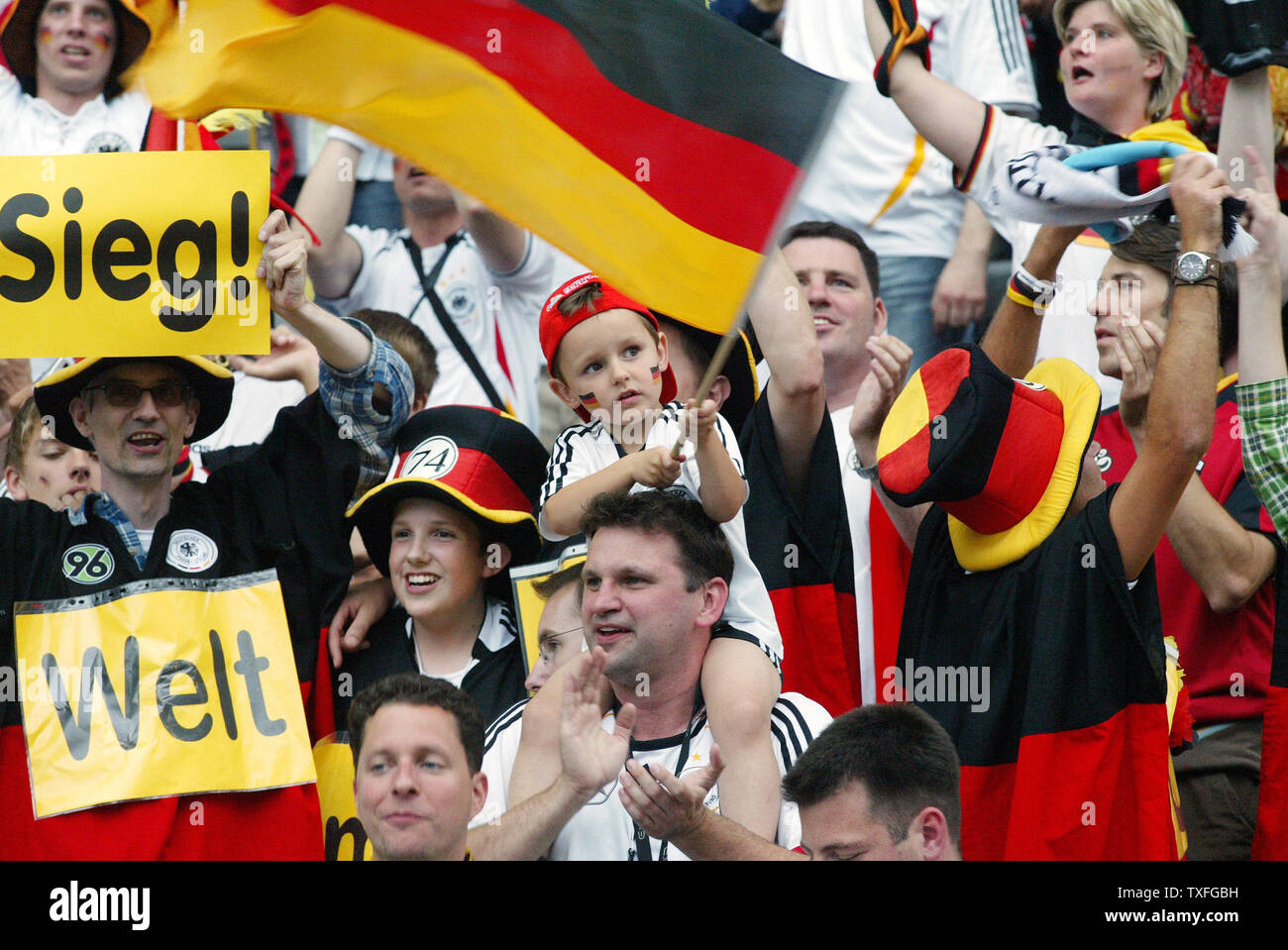 German fans cheer during World Cup soccer at Olympiastadion on Friday ...