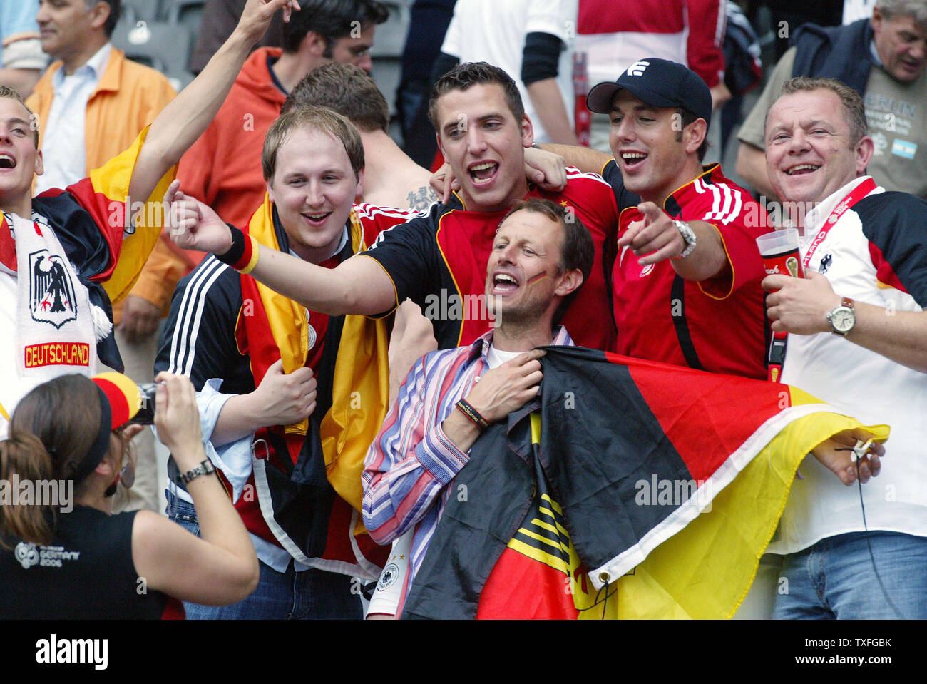 German fans cheer during World Cup soccer at Olympiastadion on Friday ...