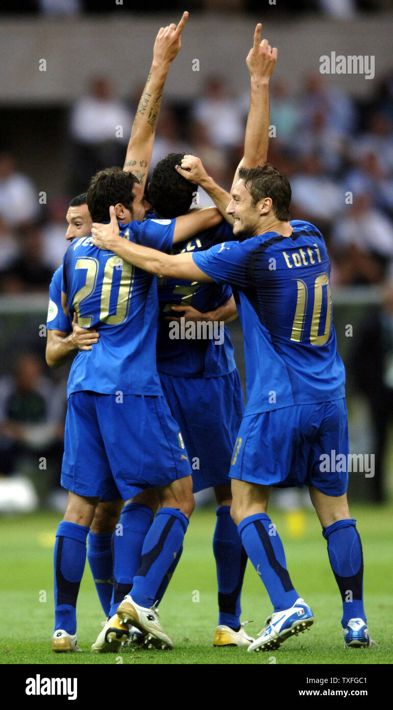 The Italian team, players Simone Perrotta (20) and Francesco Totti (10 ...