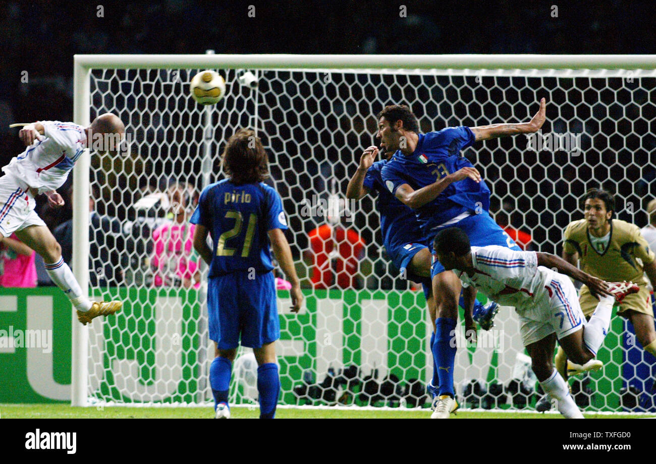 France's Zinedine Zidane (10) on the left heads the ball toward the ...