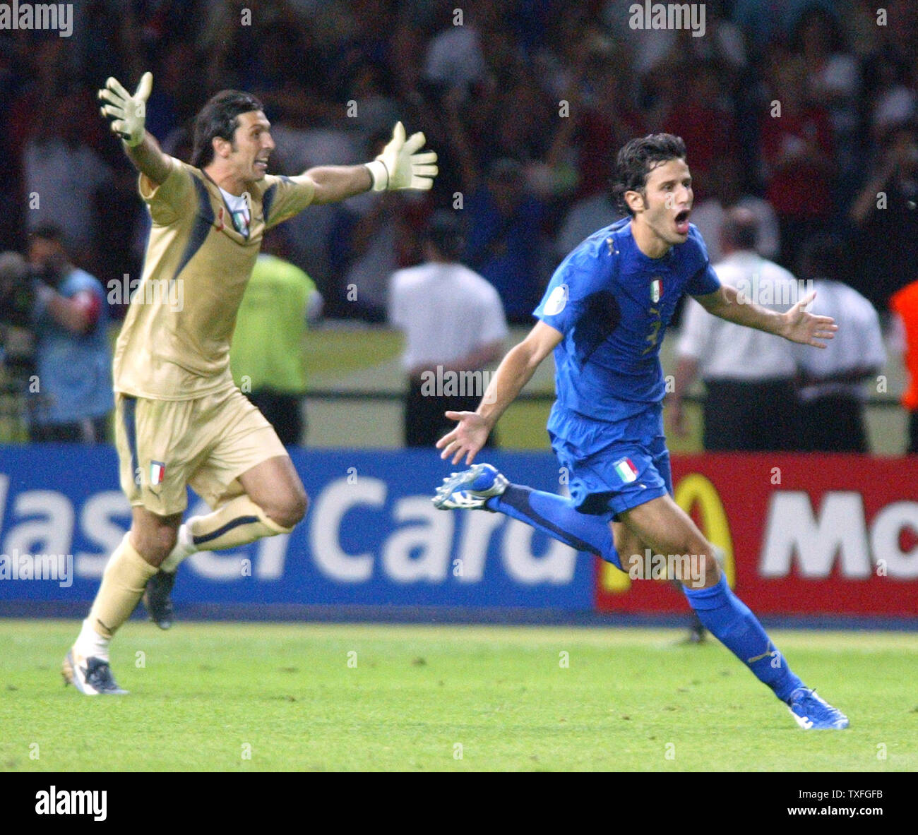 Italy's Fabio Grosso (3) and keeper Gianluigi Buffon celebrate the ...