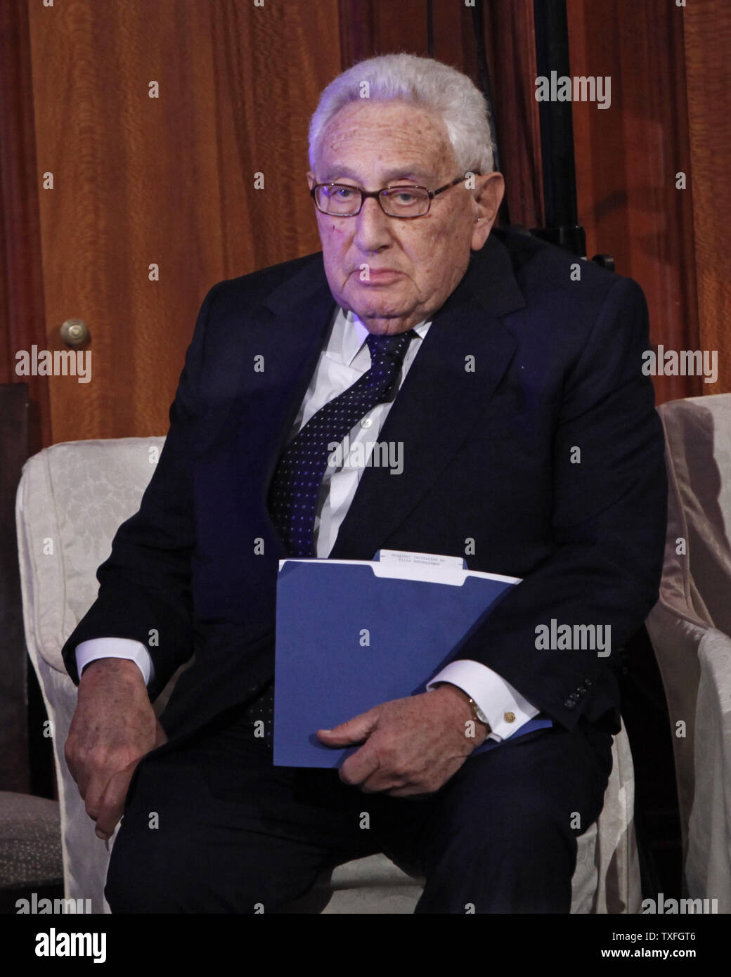 Former U.S. Secretary of State Dr. Henry Kissinger awaits the start of ...