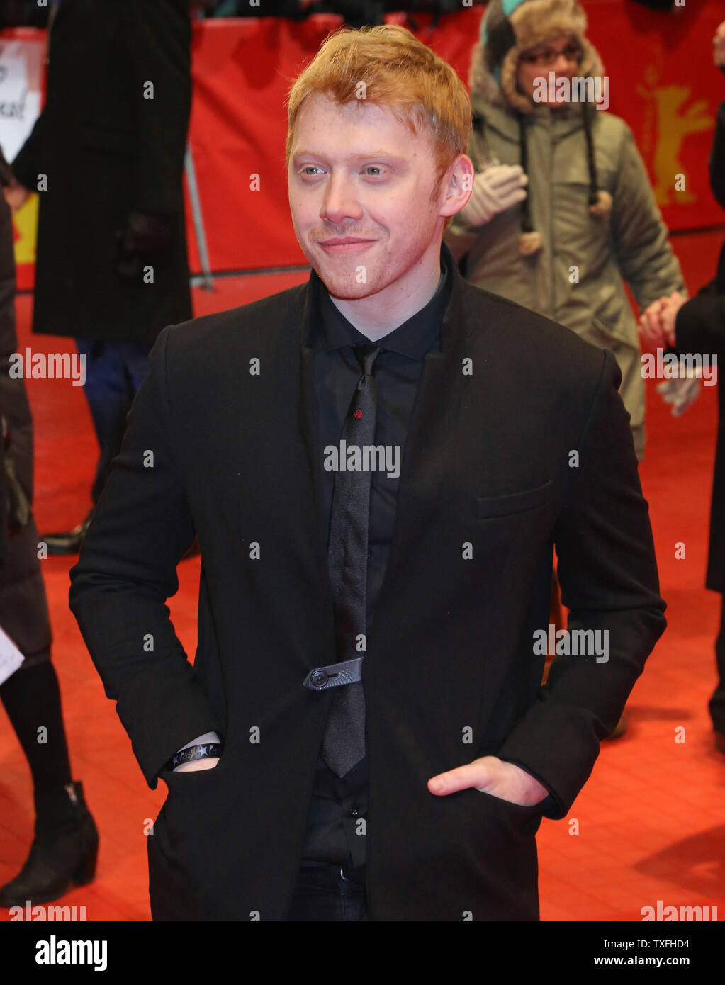 Rupert Grint arrives on the red carpet for the film "The Necessary ...
