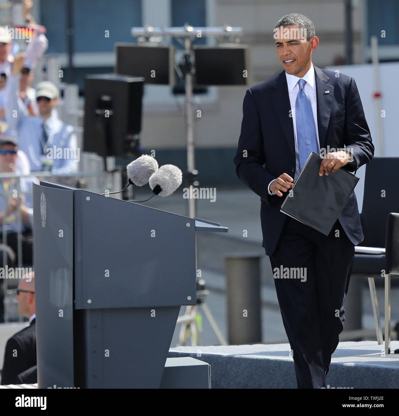 U.S. President Barack Obama arrives at the podium at the Brandenburg ...