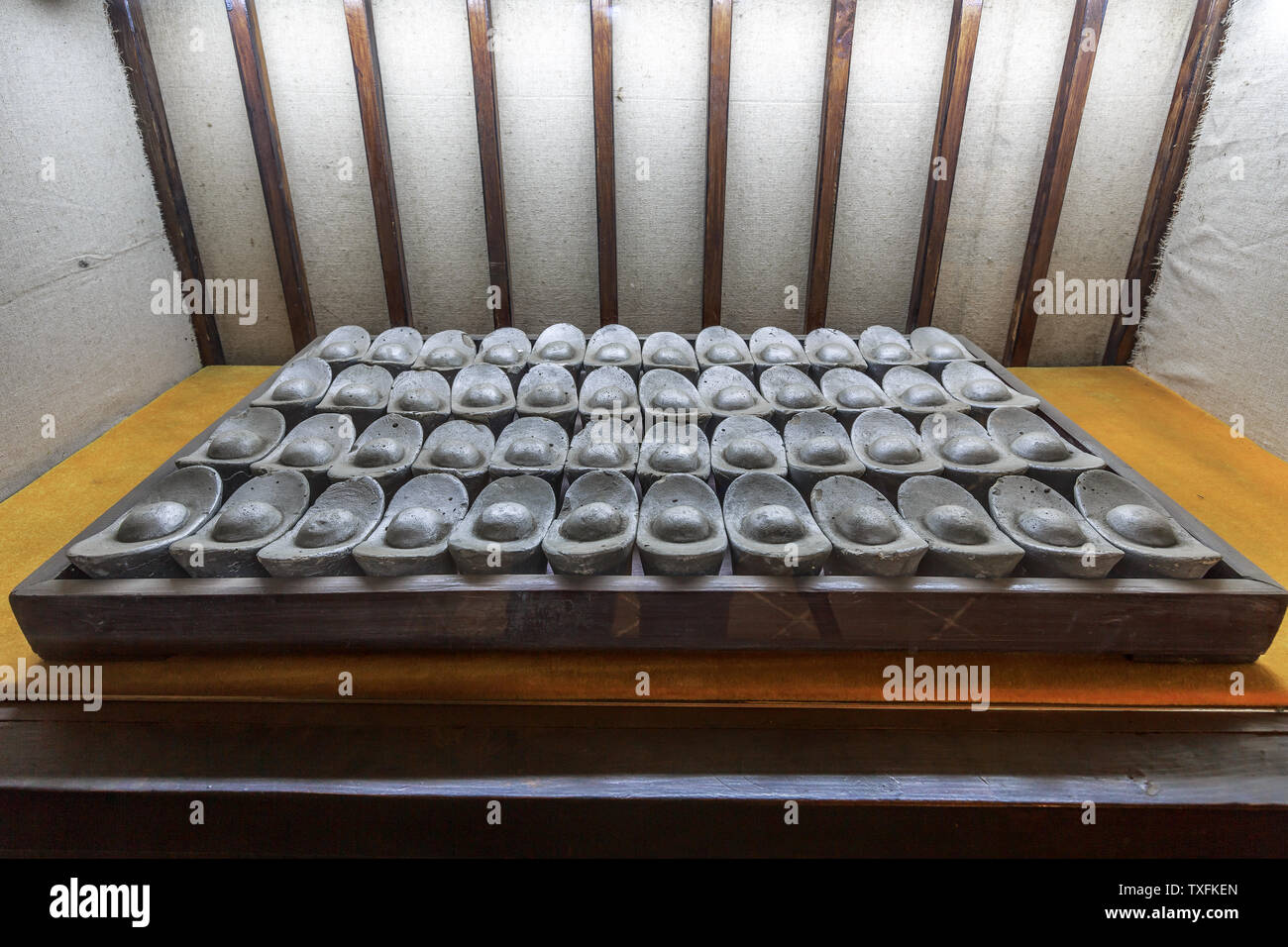 Ancient currency and silver ingots Stock Photo - Alamy