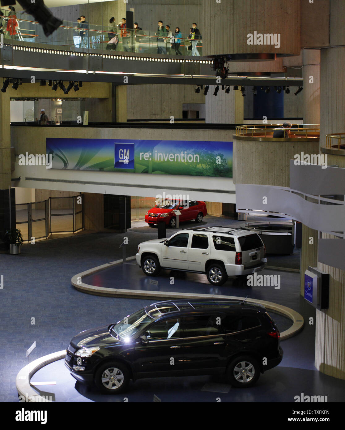 GM cars and trucks are displayed in the motor lobby at the General ...