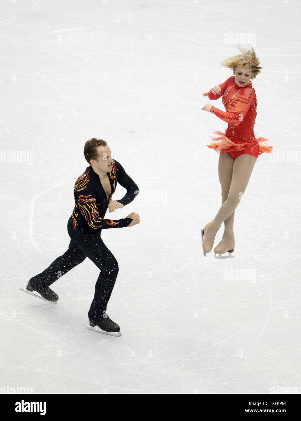 Caydee Denney (R) and Jeremy Barrett of the United States skate during ...