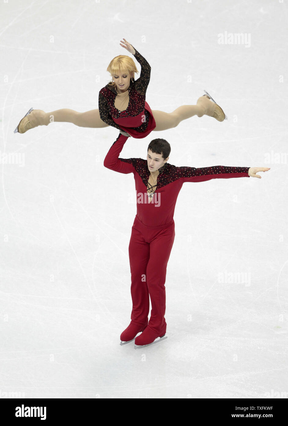 Ekaterina Kostenko (top) and Roman Talan of the Ukraine skate during ...