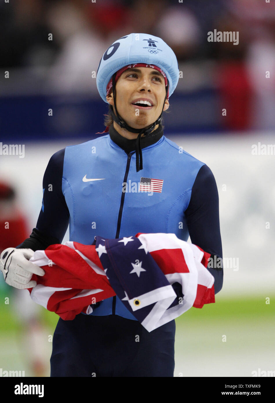 Apolo Anton Ohno of the United States reacts after winning the bronze ...