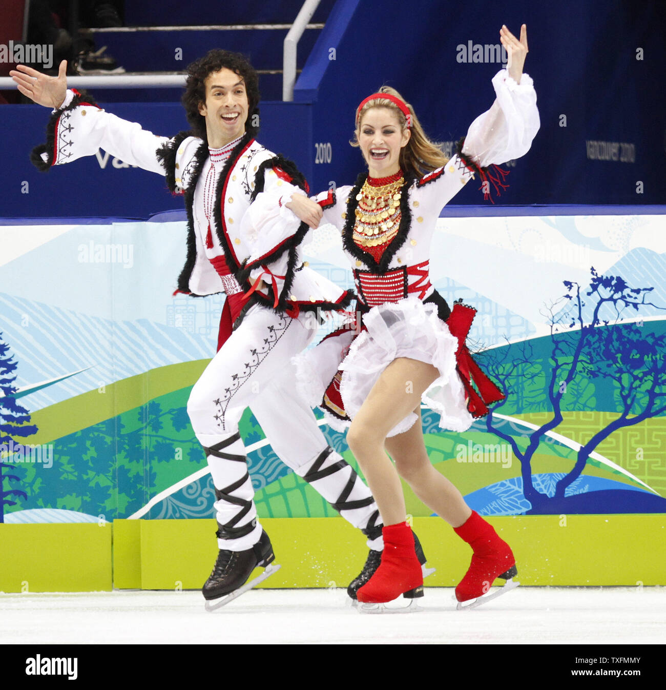 Tanith Belbin (R) and Benjamin Agosto of the United States skate during ...