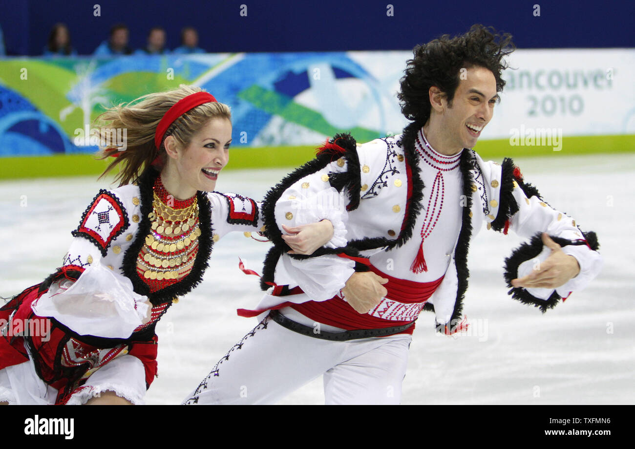 Tanith Belbin (L) and Benjamin Agosto of the United States skate during ...