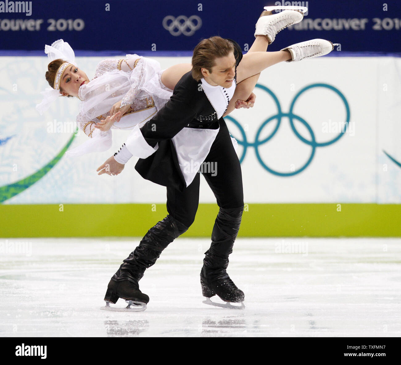Allison Reed (L) and Otar Japaridze of Georgia skate during their ...