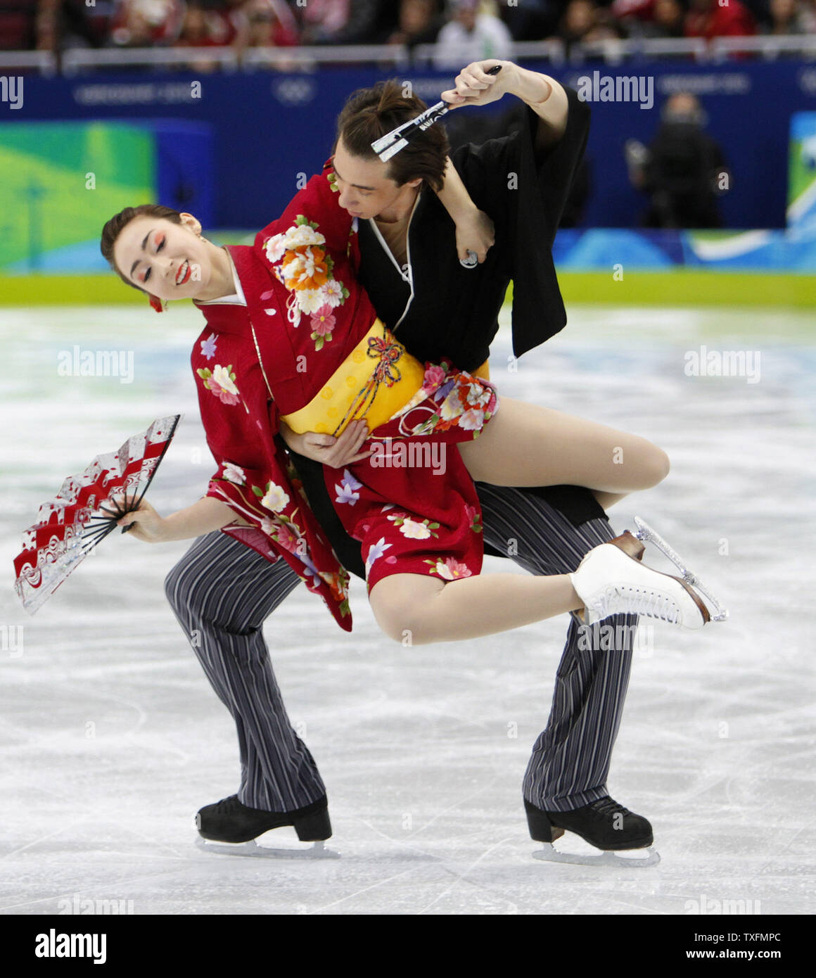 Cathy Reed (L) and Chris Reed of Japan skate during their original ...