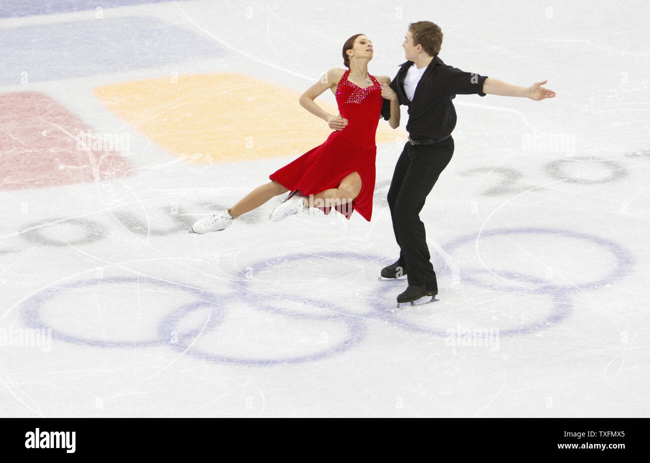 Irina Shtork (L) and Taavi Rand of Estonia skate their free program in ...