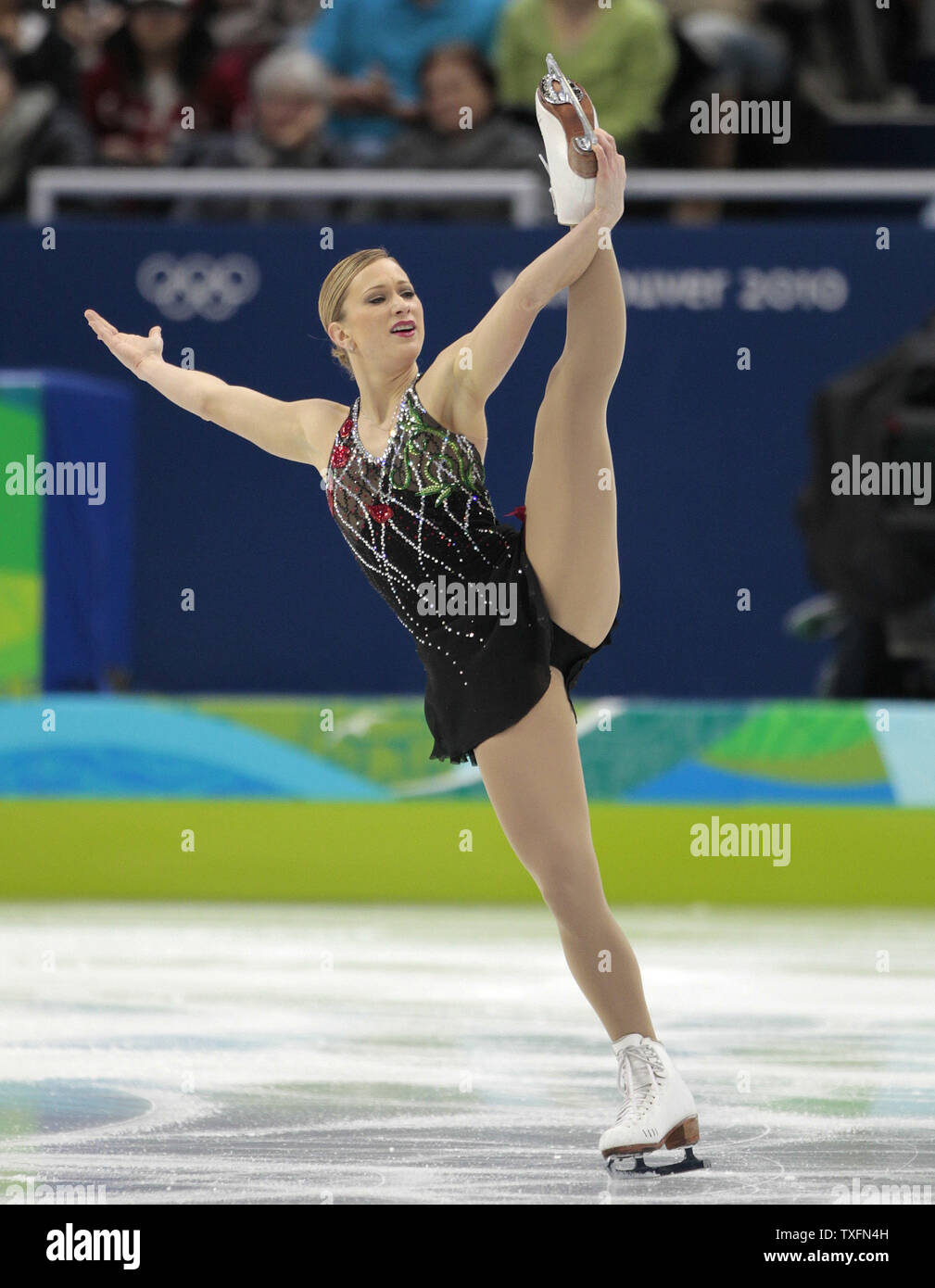 Joannie Rochette of Canada skates her short program in the women's ...