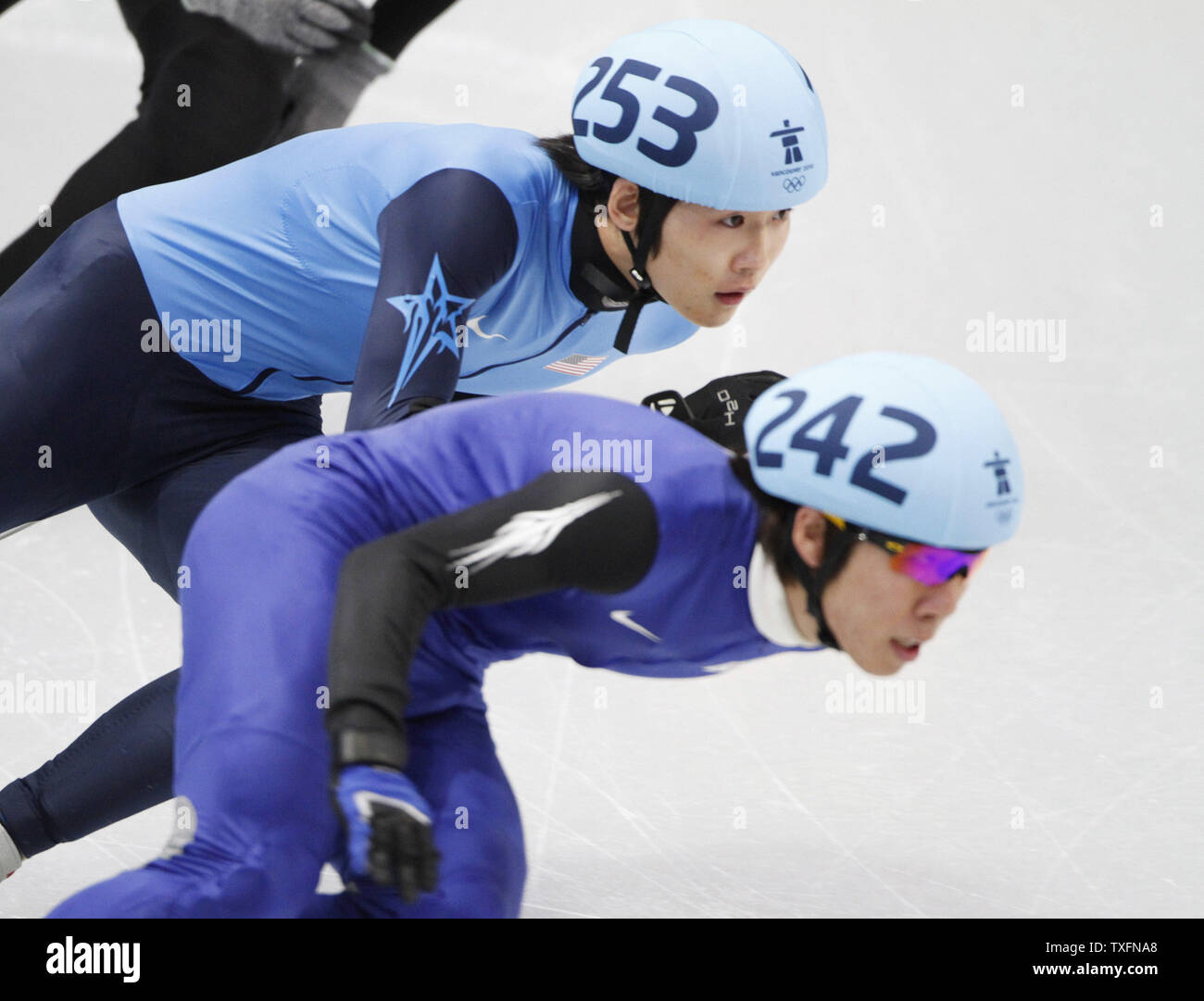 Simon Cho of the United States (L) chases Ho-Suk Lee of the Republic of ...