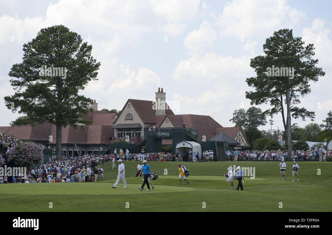A group of golfers walk up the 10th fairway during the second round of ...