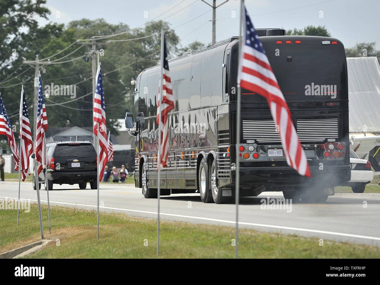 U. S. President Barack Obama leaves a town hall meeting in a newly ...