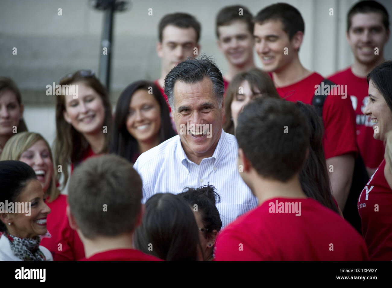 Republican Presidential hopeful Mitt Romney smiles as he greets Bradley ...