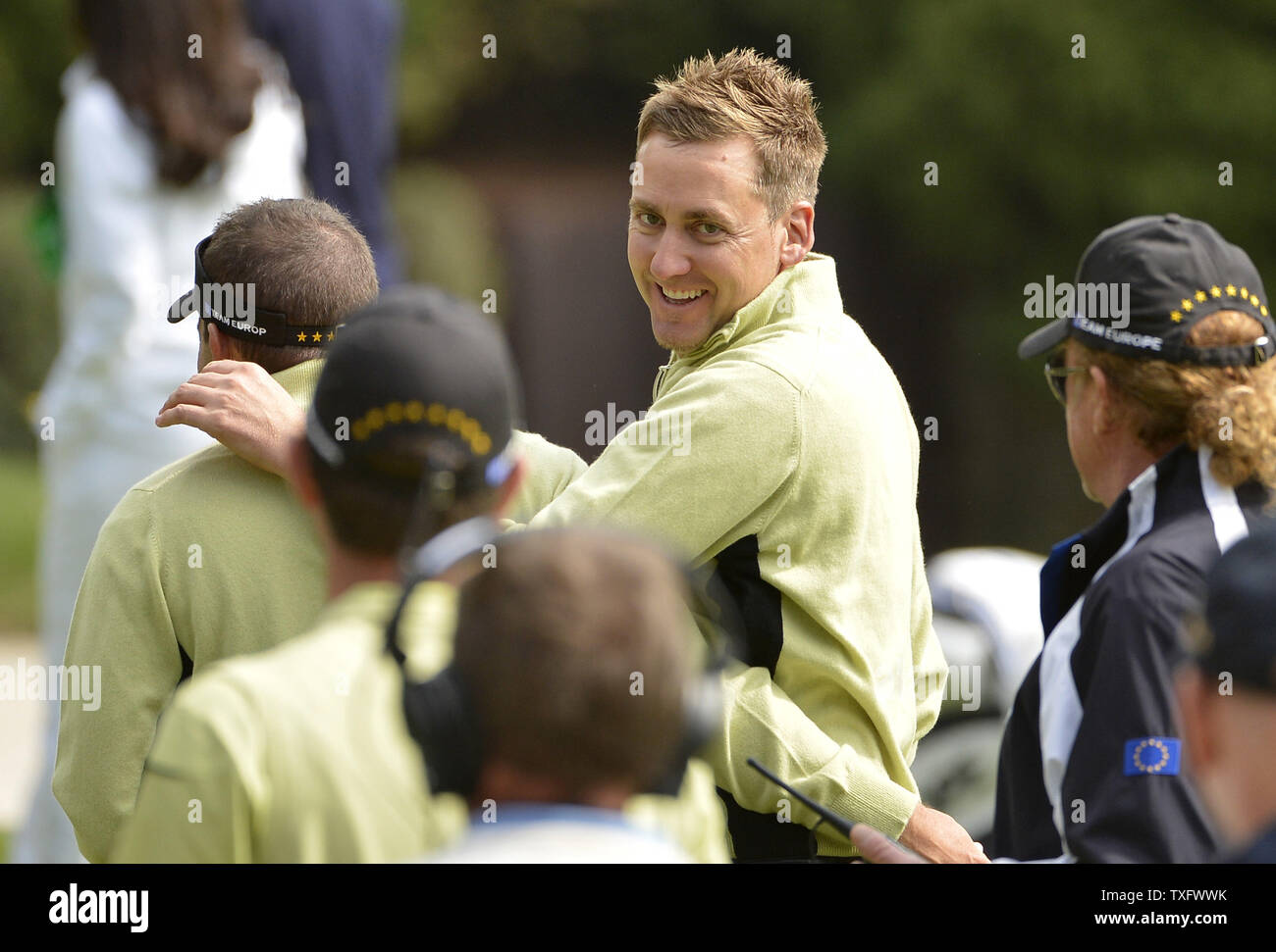 Team Europe's Ian Poulter of England smiles after winning his match at ...