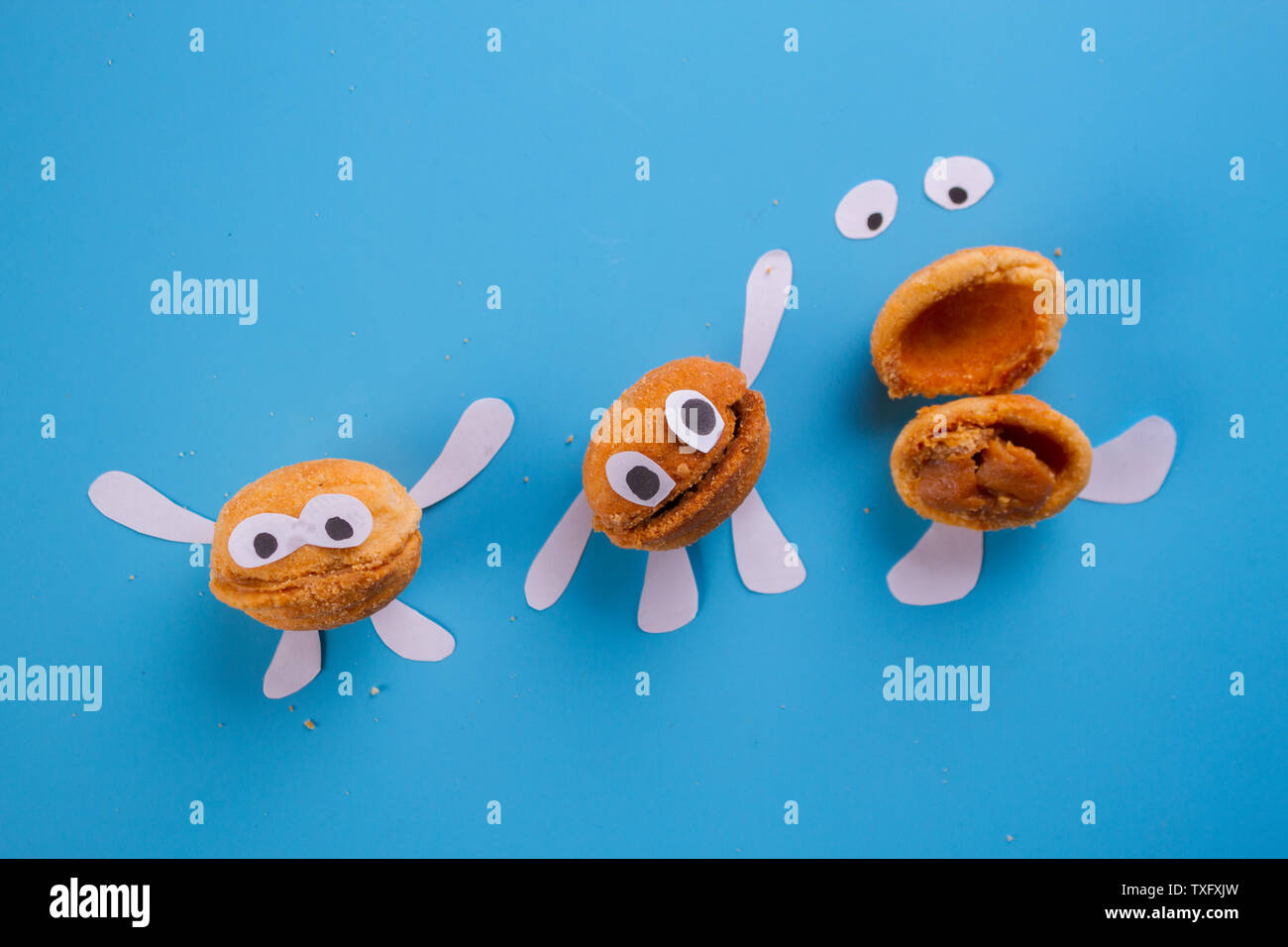 cookies with nutella in a shape of a nut Stock Photo - Alamy